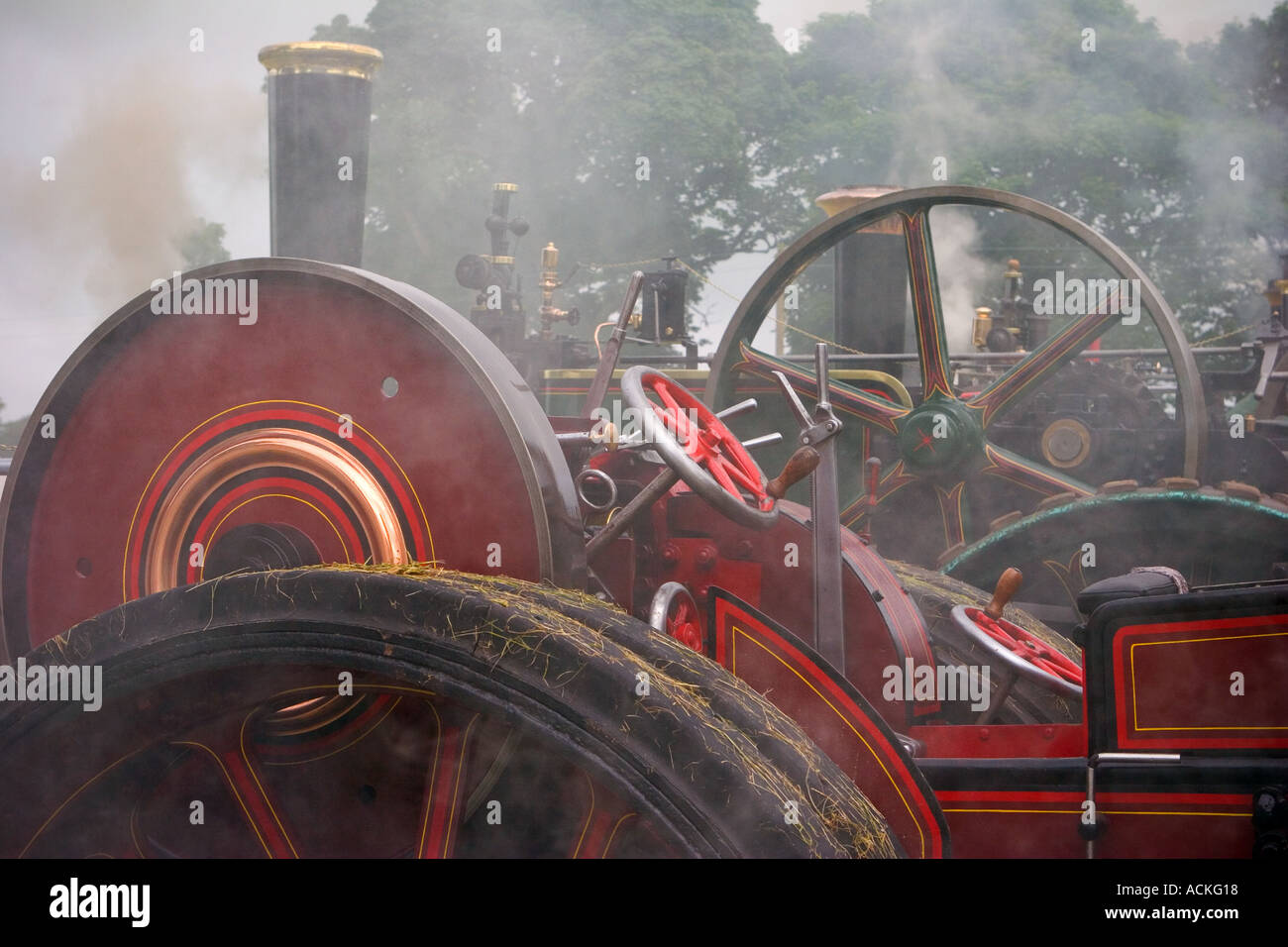 Steam engine rally - showing smoking fly-wheels soon after engines ...