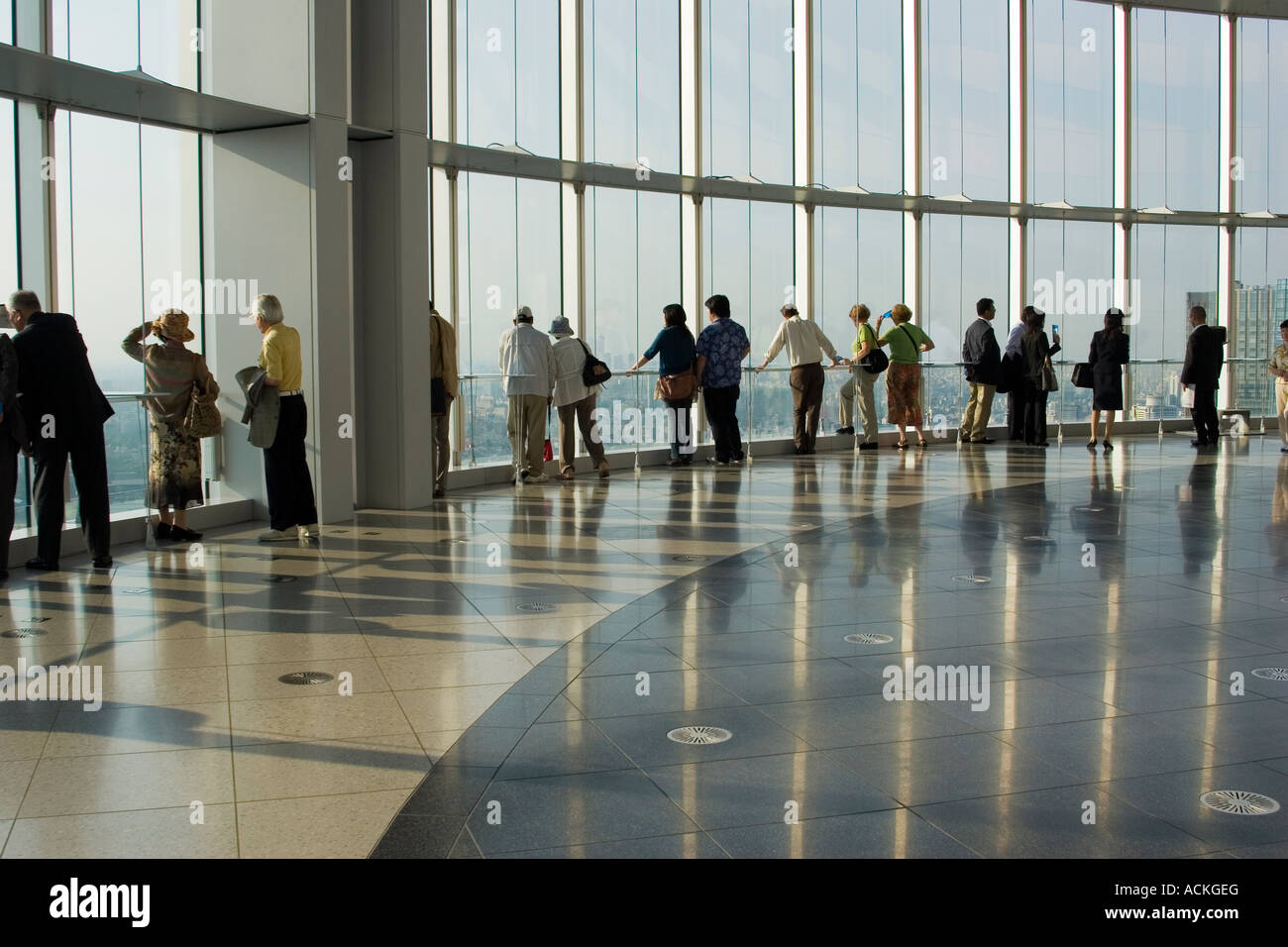 People of different shapes and sizes looking out picture windows to ...