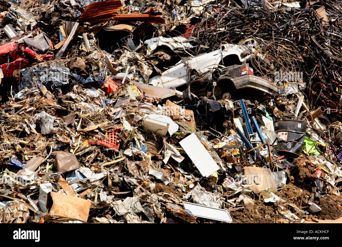 Large heap of compacted cars and other scrap metal ready for recycling ...