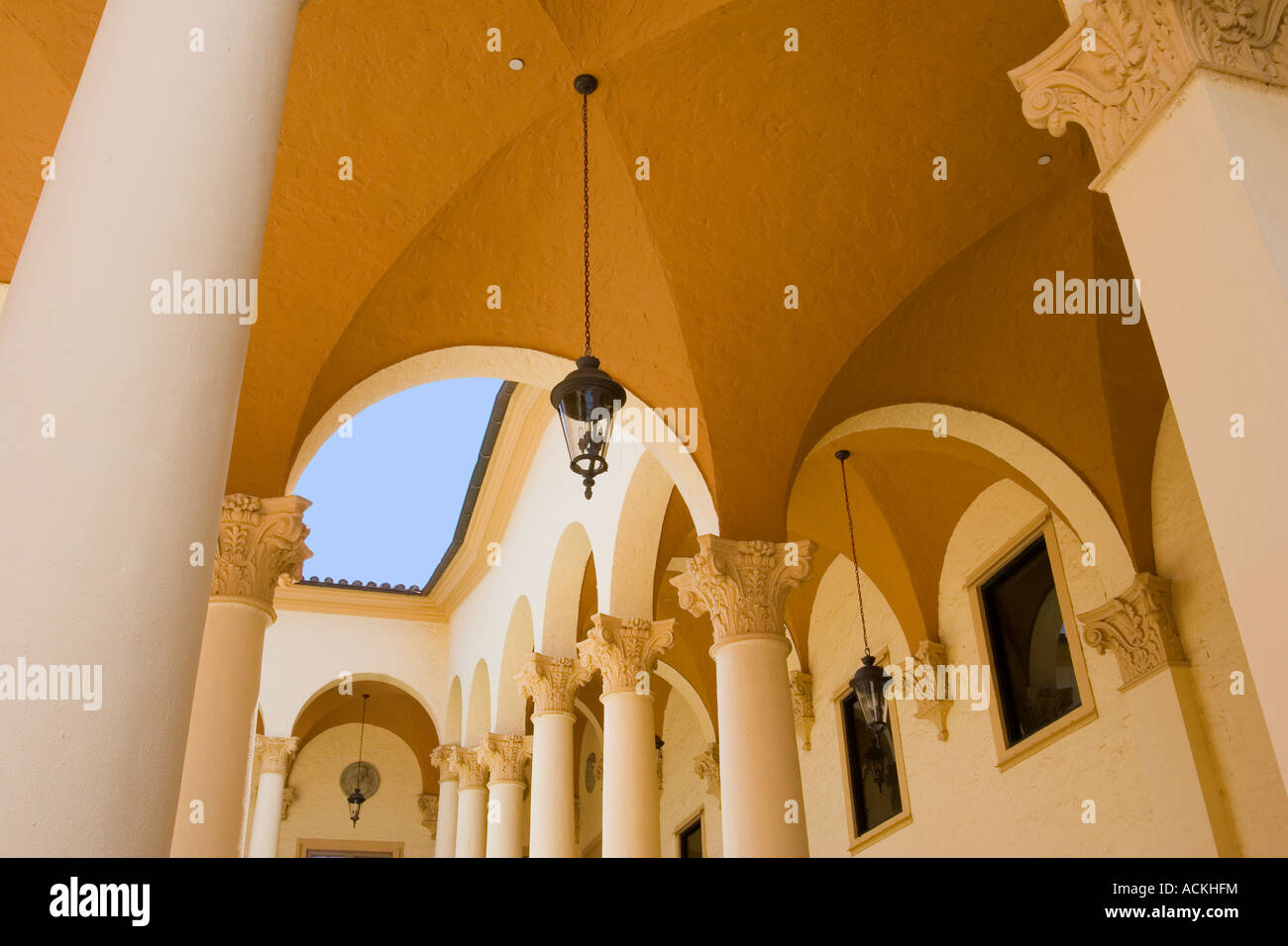 Arches and columns making up a Mediterranean style courtyard portico ...
