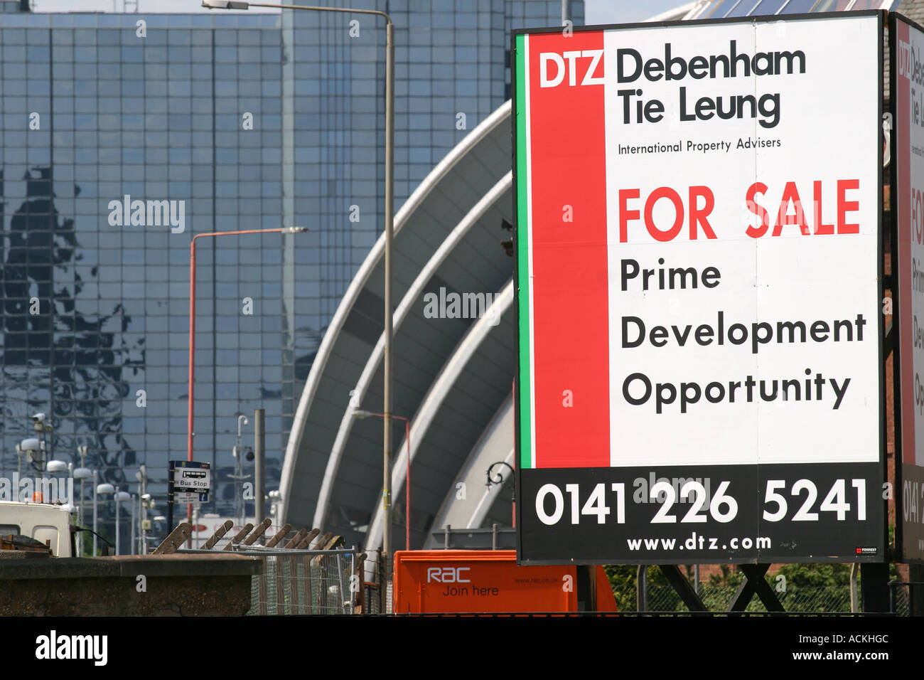 For sale sign in Glasgow with the Scottish Conference centre and hotels ...
