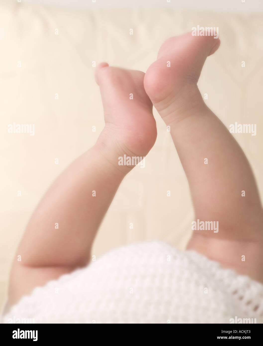 Baby legs and feet Stock Photo - Alamy