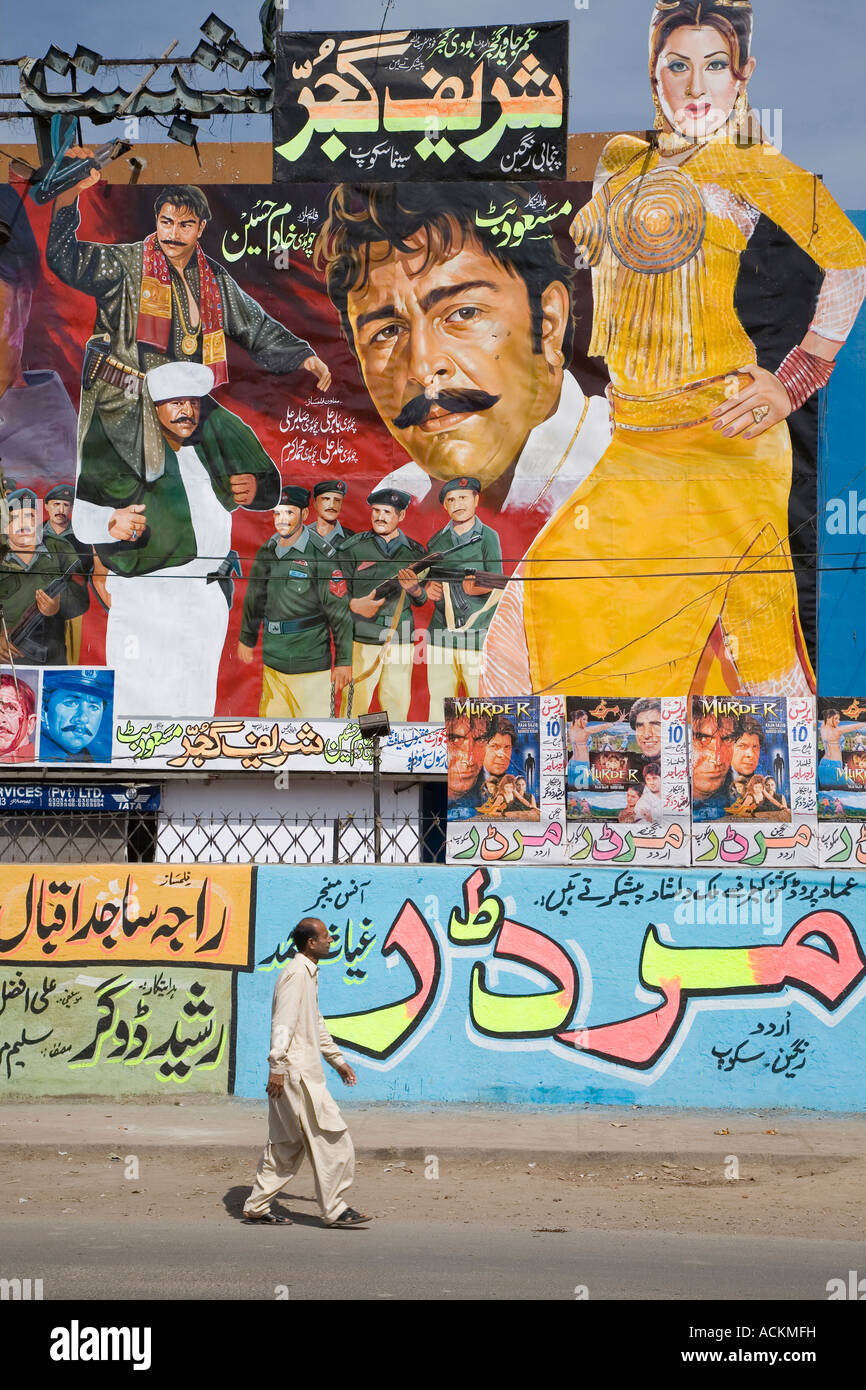 Hand painted billboards advertising movies outside a cinema (possibly ...