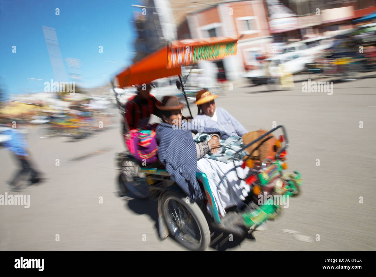 bowler hat women in rickshaw, Puno, Peru Stock Photo - Alamy