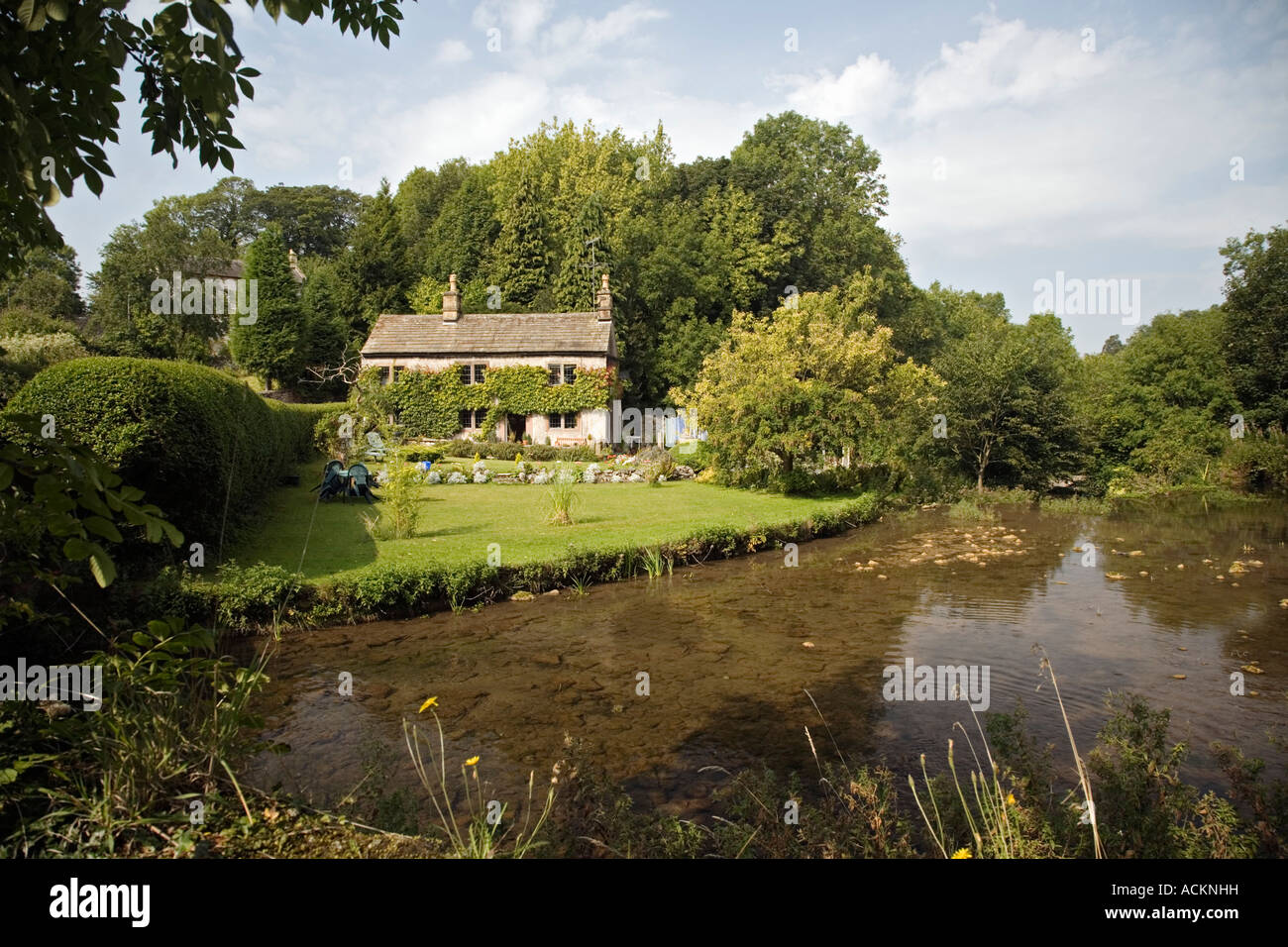 River Lathkill Mill Pond and Weir Alport Village Derbyshire Stock Photo ...