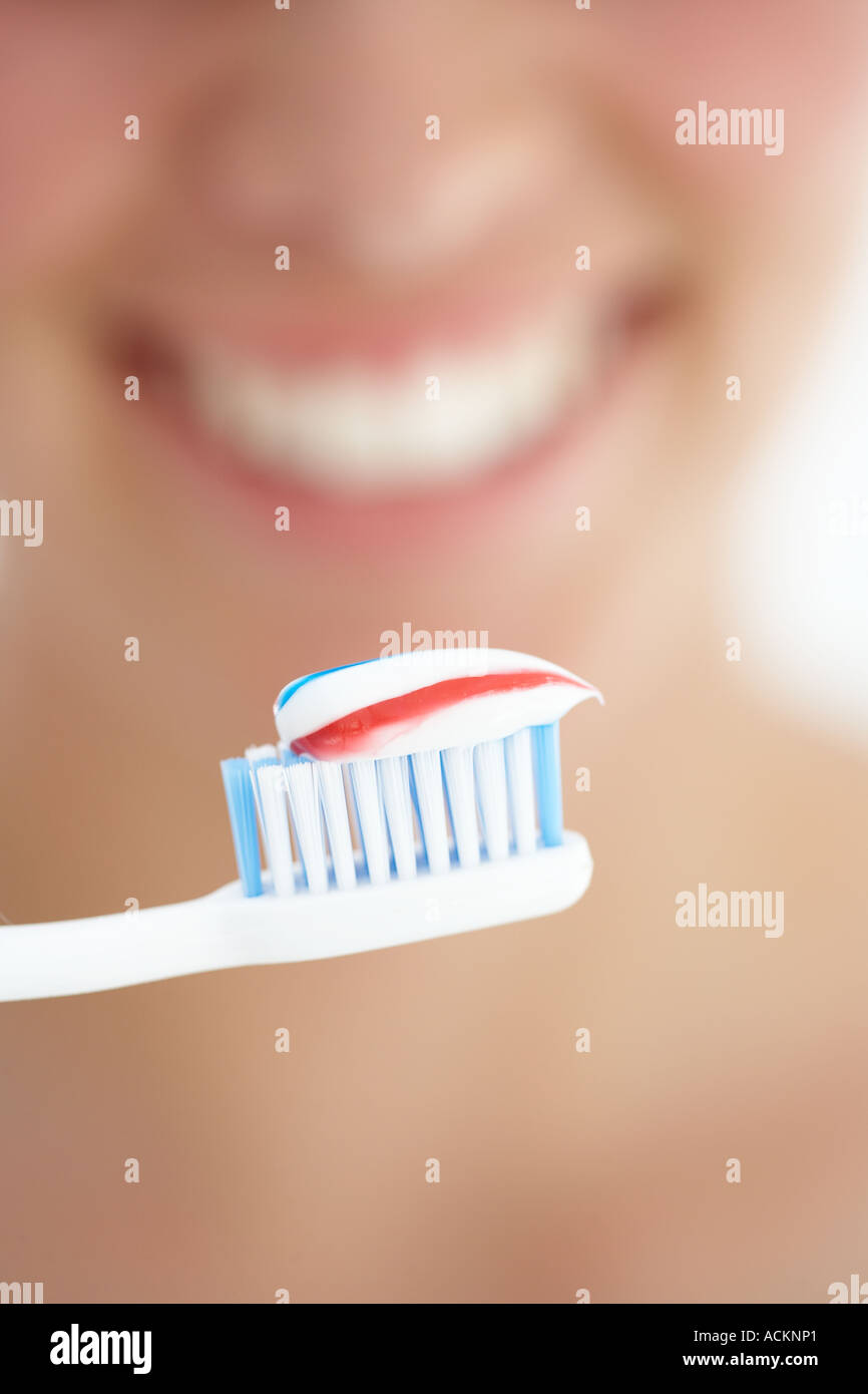 A brush with toothpaste close up Stock Photo - Alamy