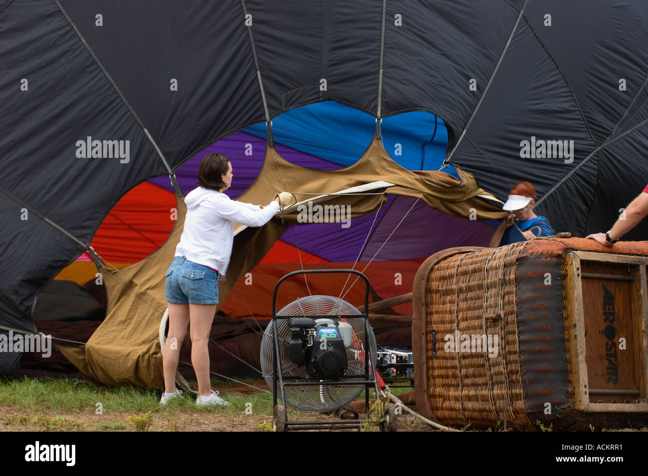 Hot air balloons being inflated at balloon festival in Dunnellon ...