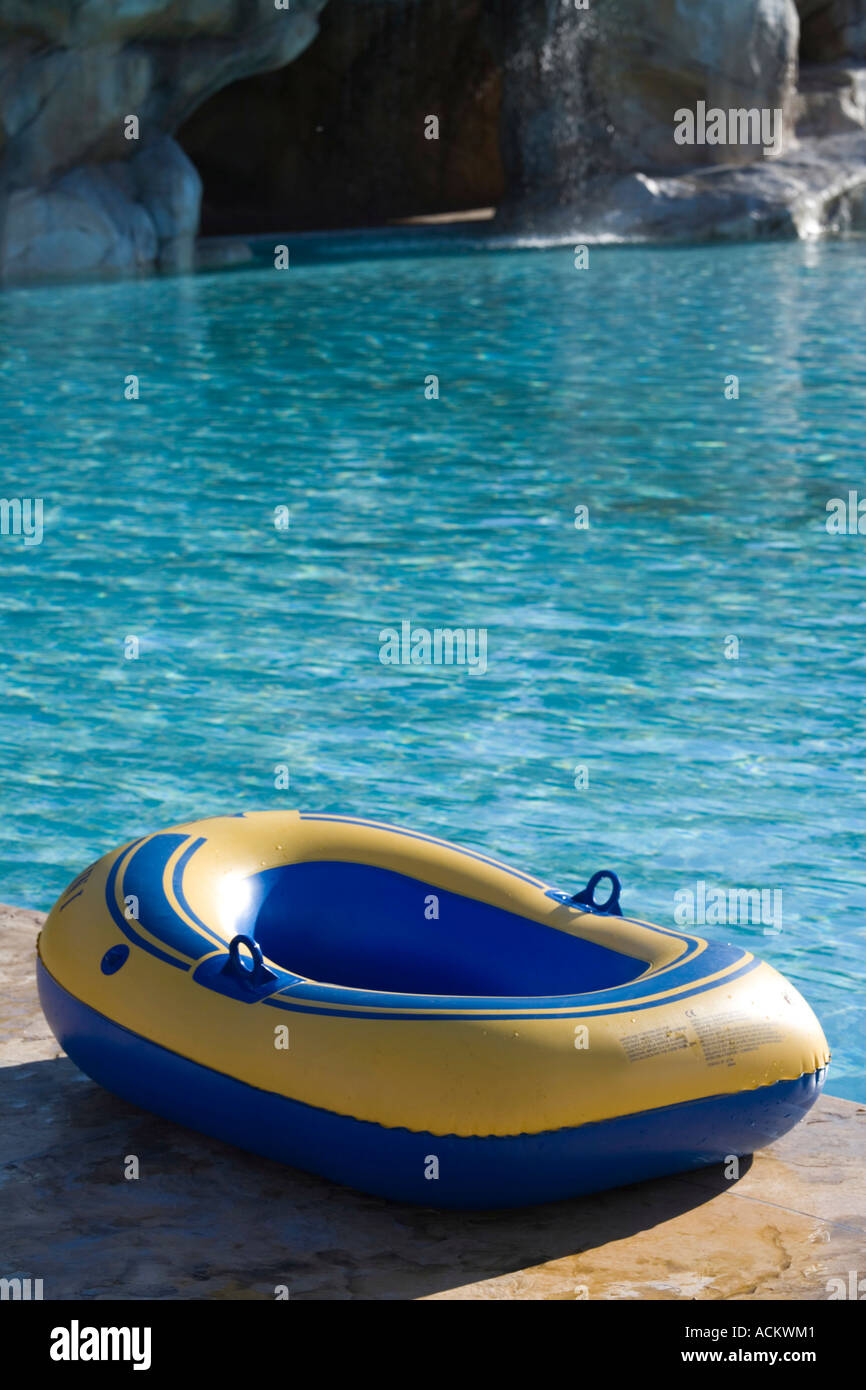 Rowing boat by the pool Stock Photo - Alamy