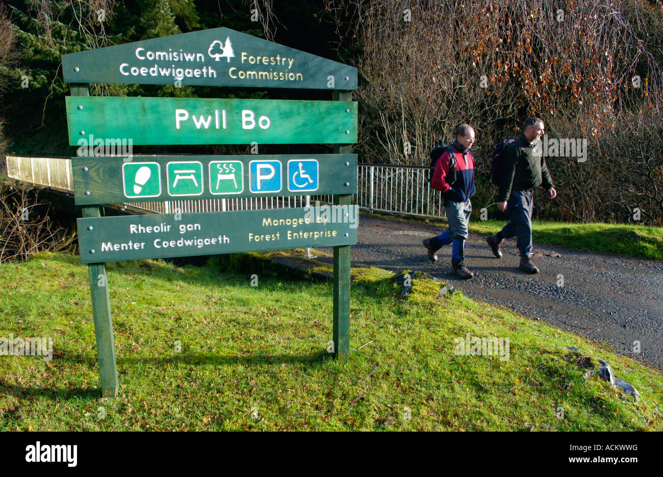 Walkers at PWLL BO picnic site near Llanwrtyd Wells Powys Wales UK ...