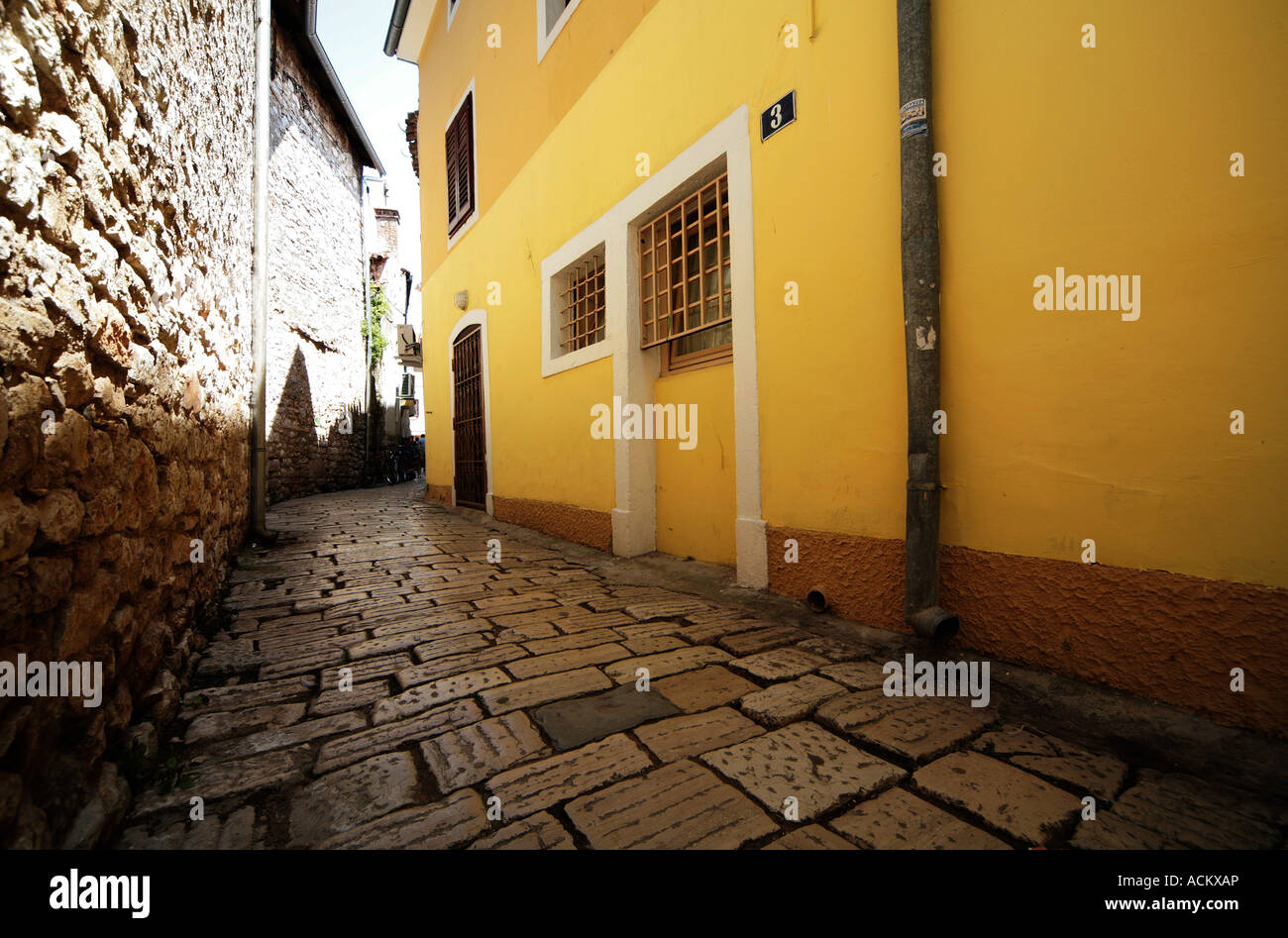 Empty back street in Porec Istria Stock Photo - Alamy
