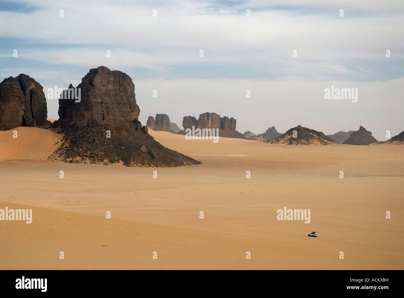 A Tuareg Landcruiser crosses the awesome Tassili N Ajjer landscape in ...