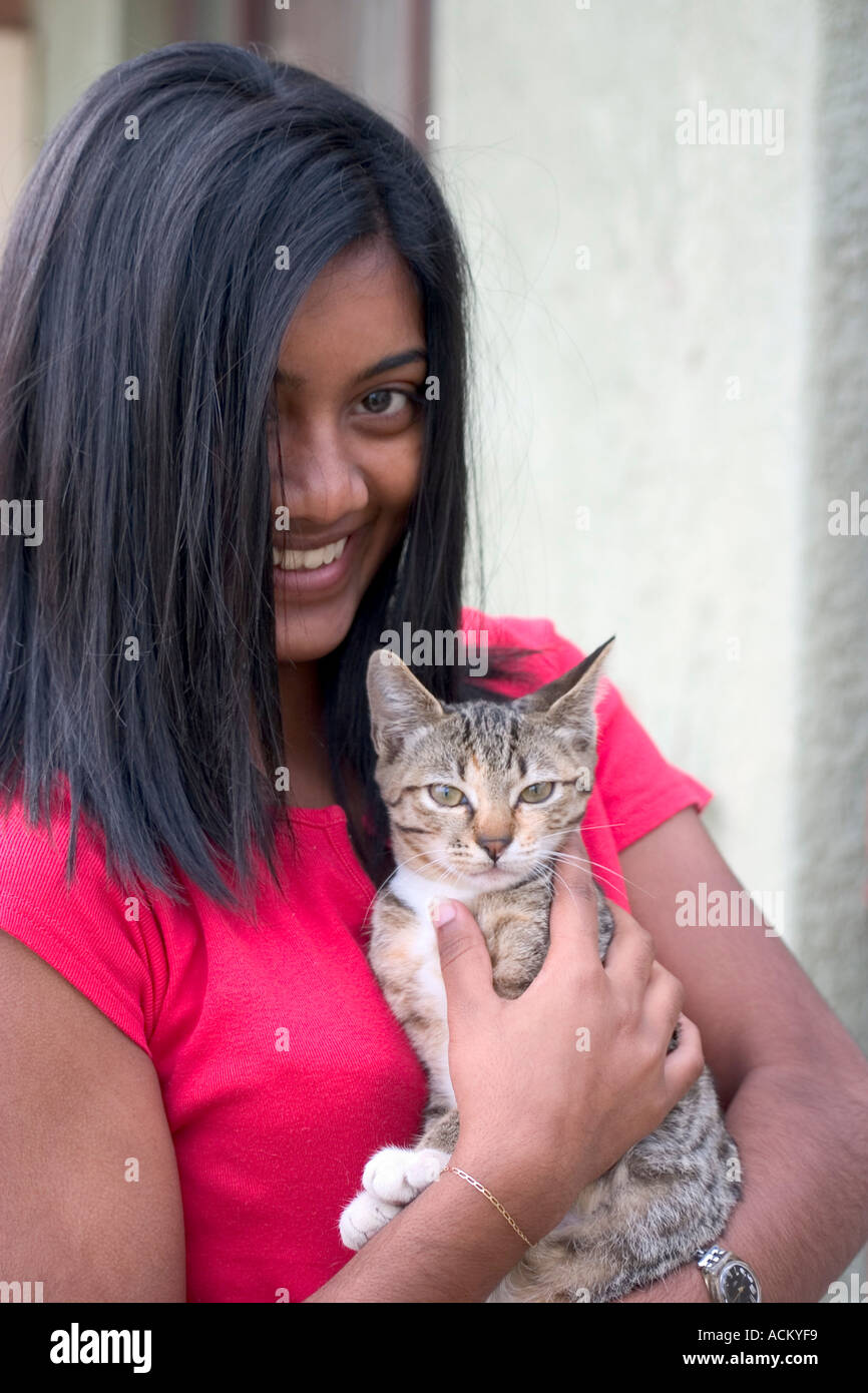 Indian girl with pet cat hi-res stock photography and images - Alamy