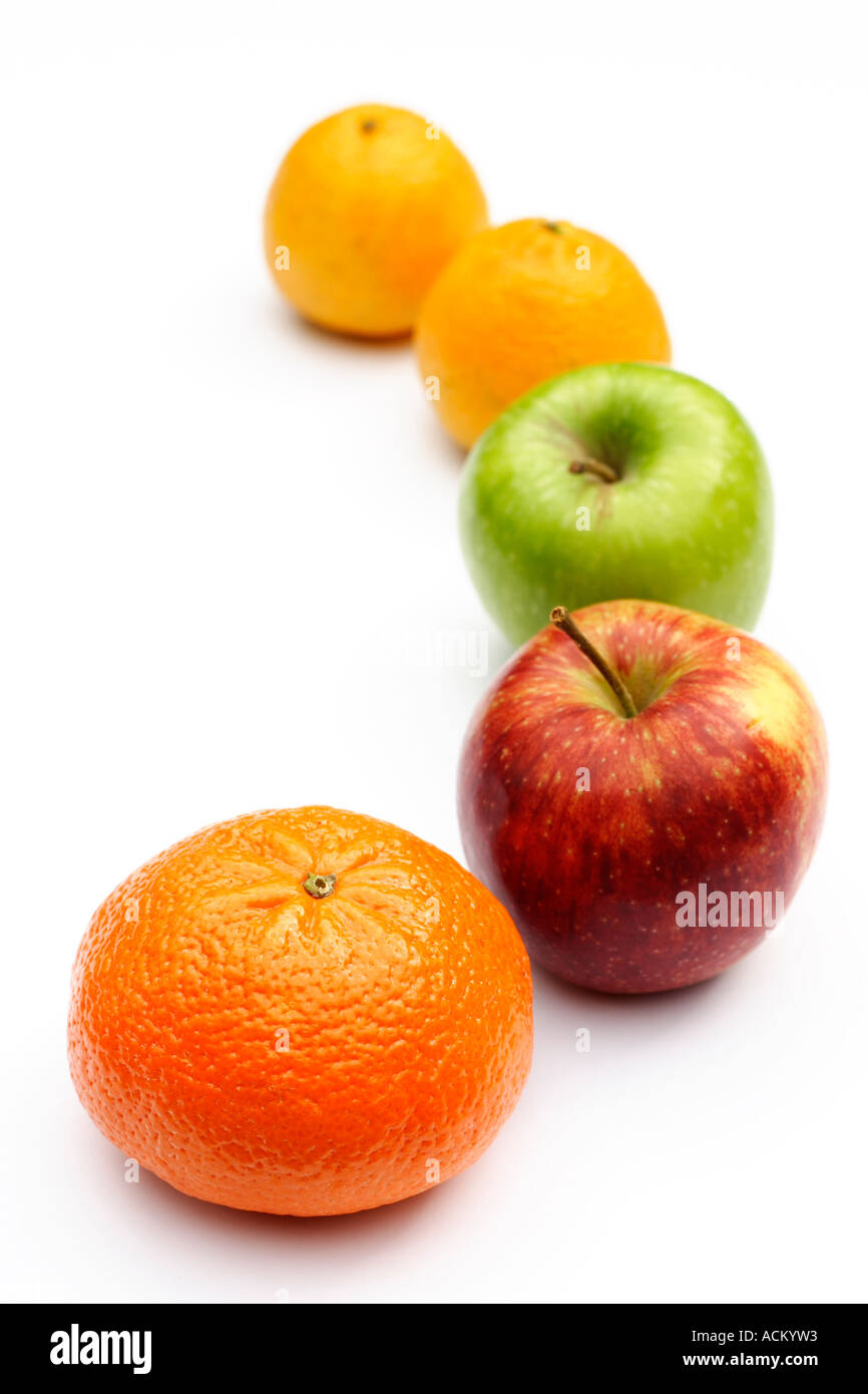 Five pieces of fruit in a line on a white background Stock Photo - Alamy