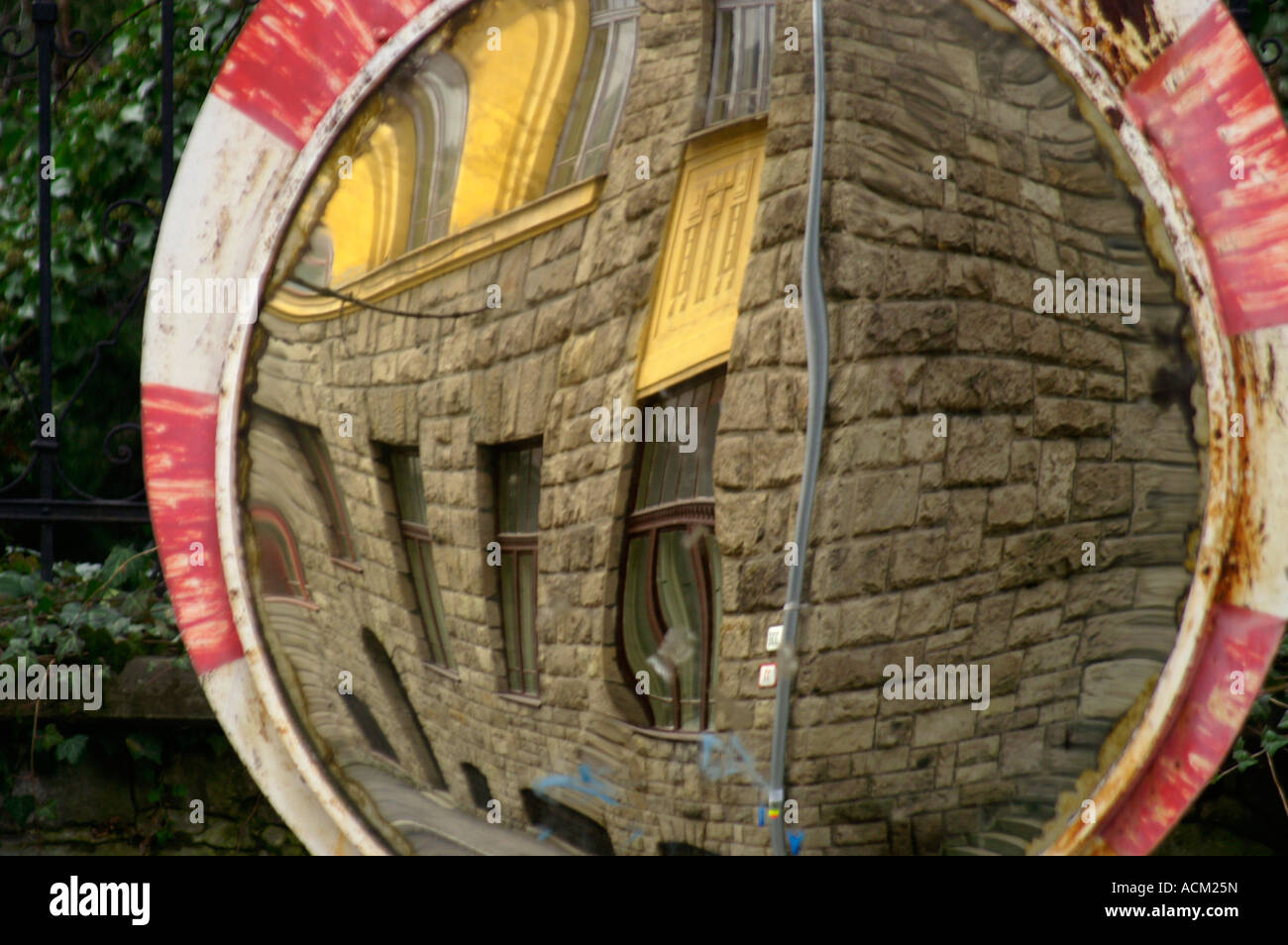 Circular mirror at corner of road crossing Stock Photo - Alamy