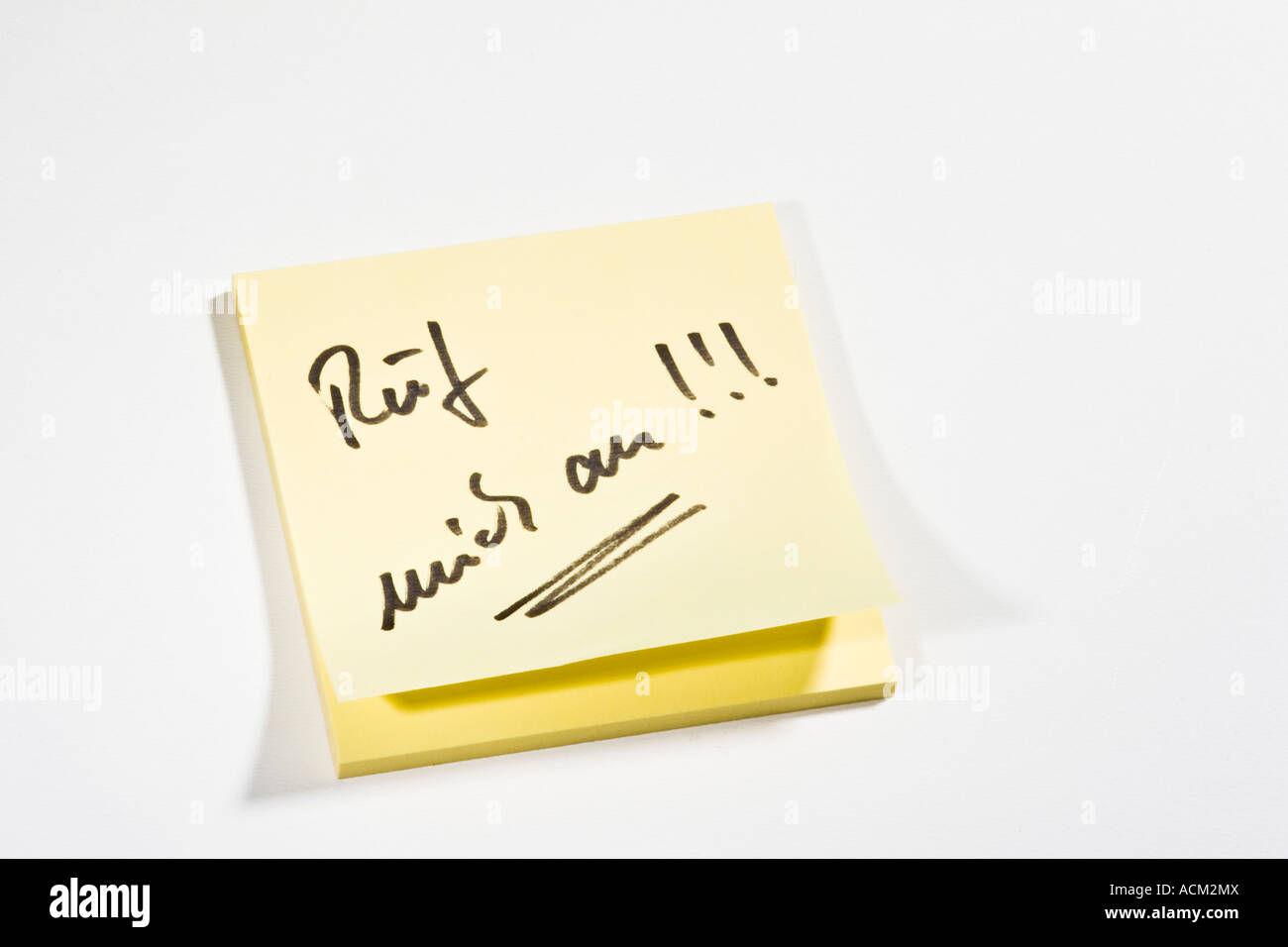 yellow sticky note with text Stock Photo - Alamy