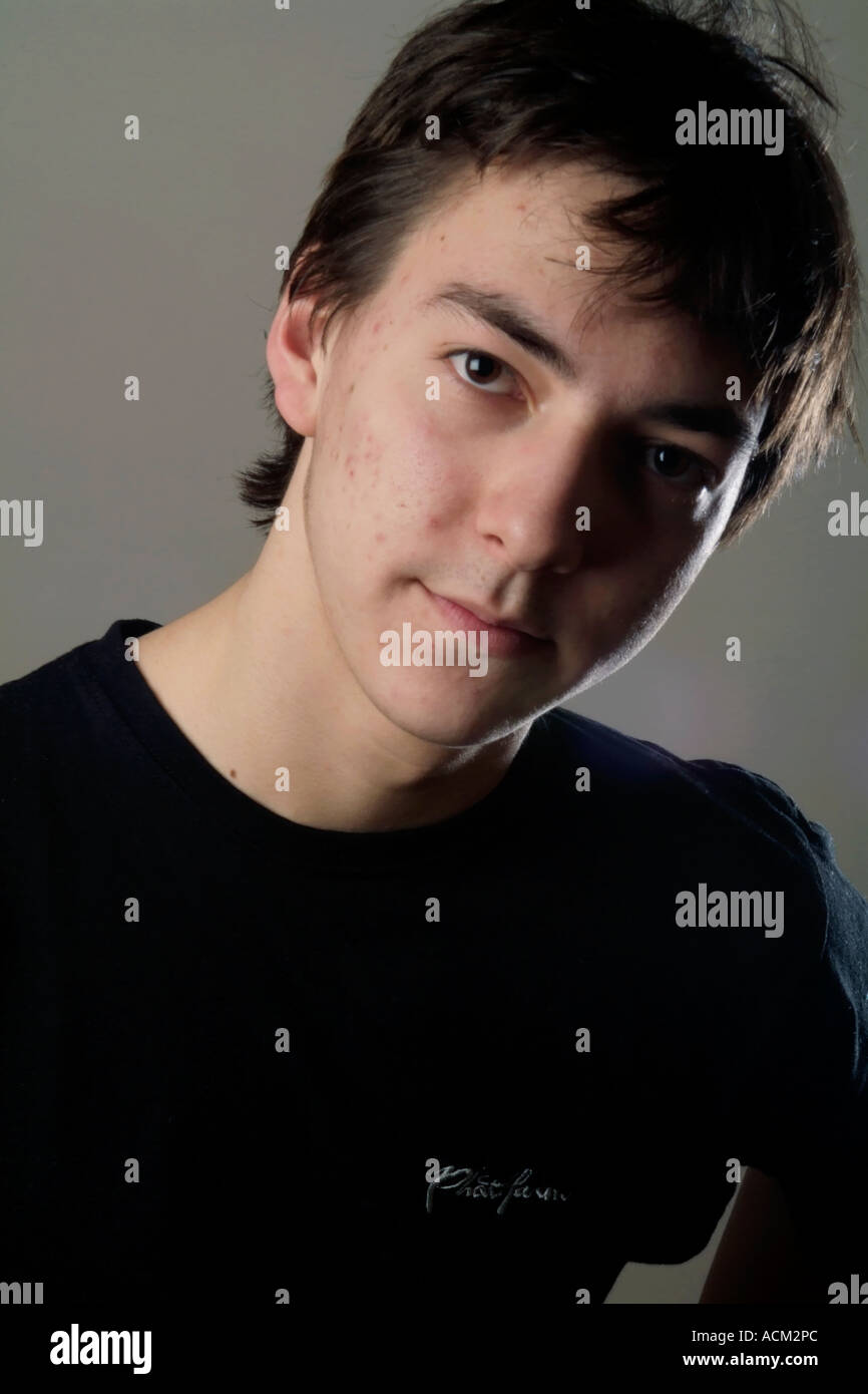 Portrait of teenage boy looking straight at the viewer Stock Photo - Alamy