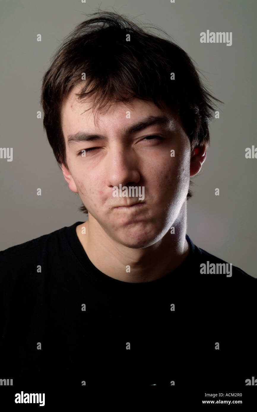 Squinting face teen hi-res stock photography and images - Alamy