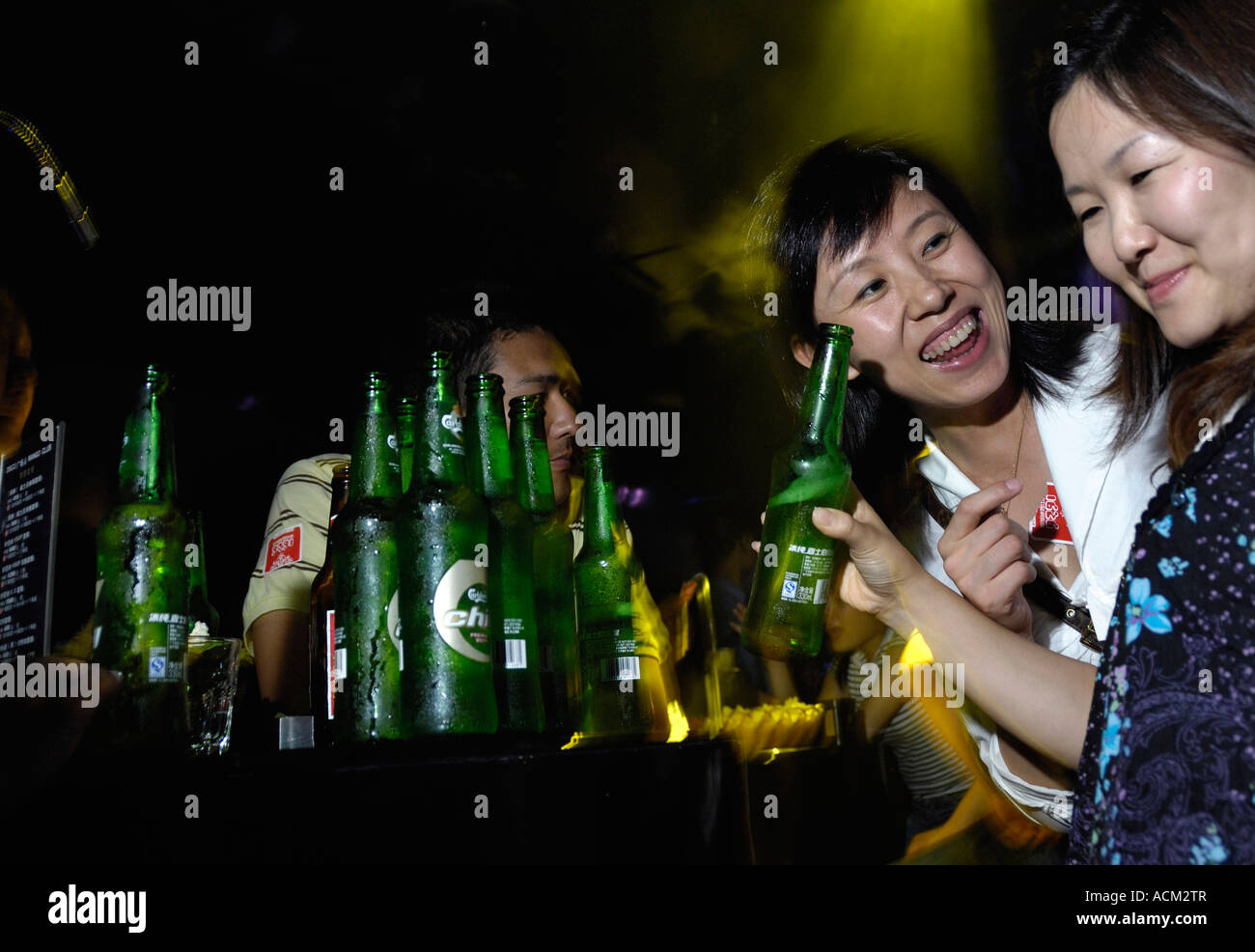 Chinese young people drink Carlsberg beer at a nightclub Club Tango in ...