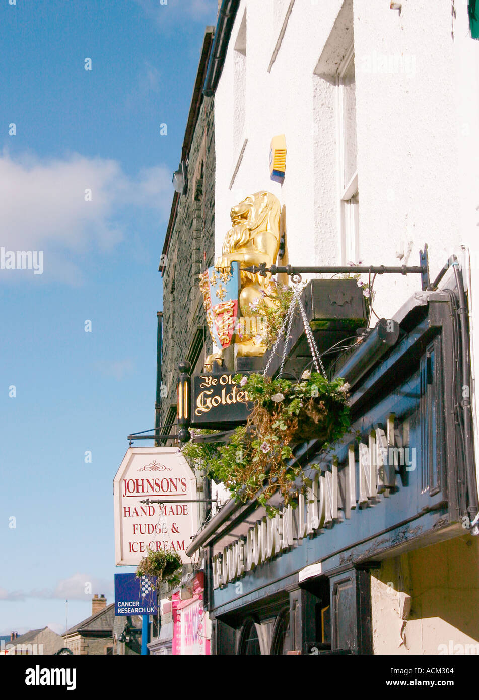 shops and pub in Keswick England Stock Photo - Alamy
