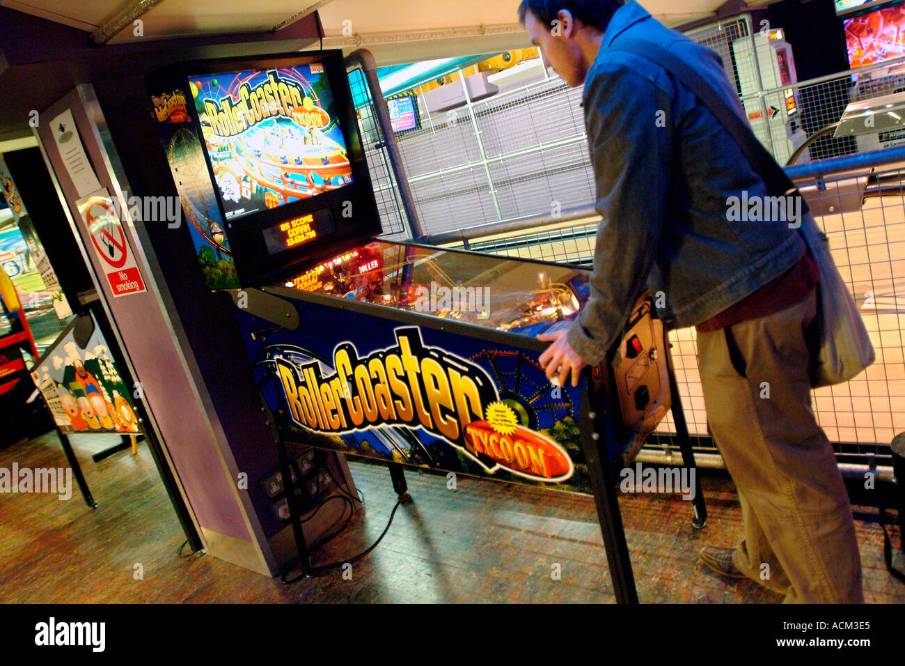 Pinball machine player hi-res stock photography and images - Alamy