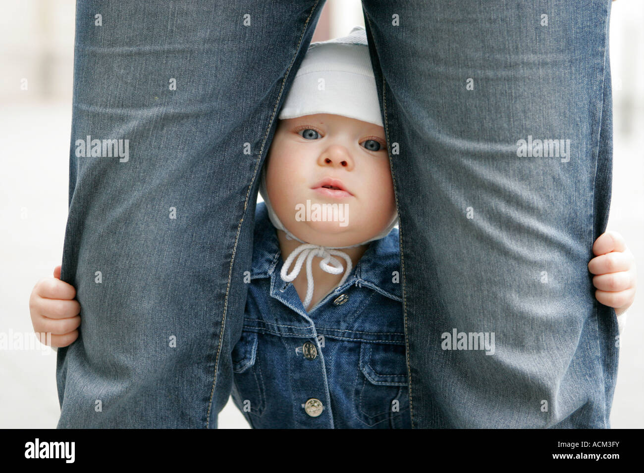 Baby head between legs hi-res stock photography and images - Alamy