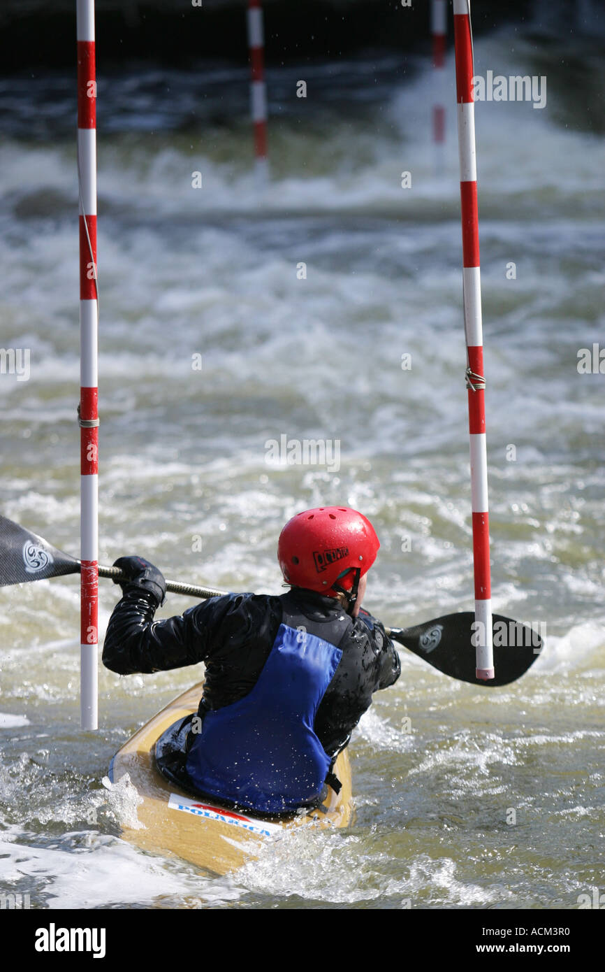 Person competing in canoe slalom Stock Photo - Alamy