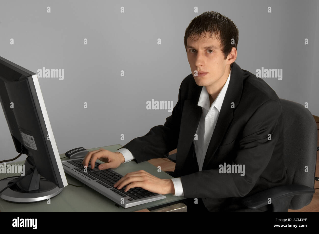Man with calculator natural hi-res stock photography and images - Alamy