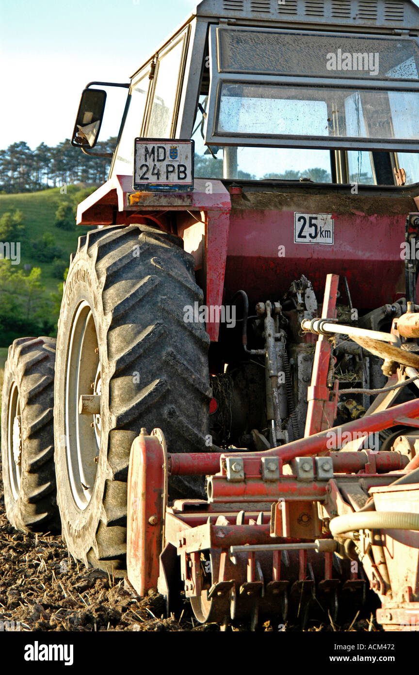 A Tractor plowing a field Tractor with a plow Stock Photo - Alamy