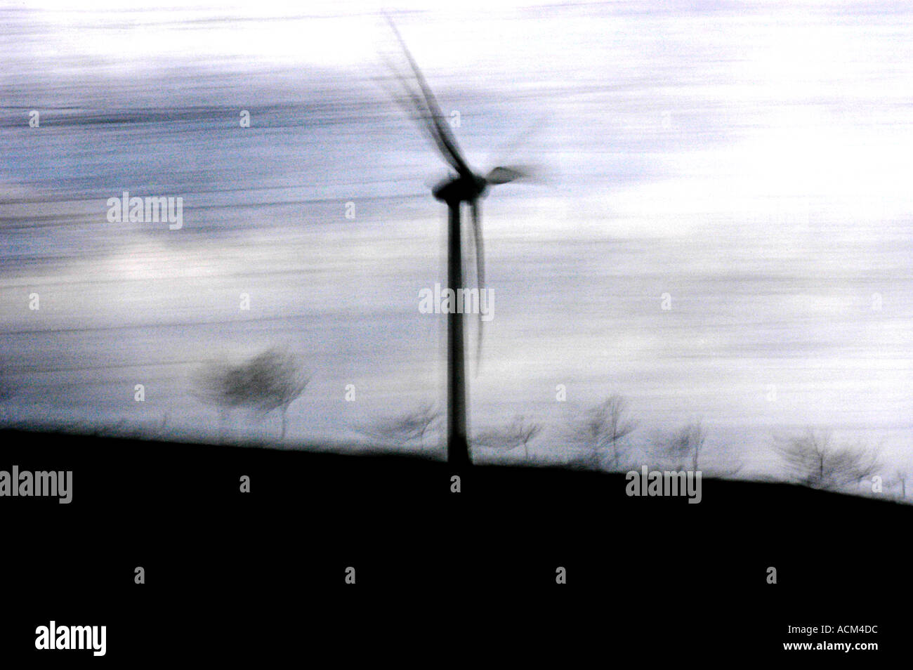 A wind engine turning in the wind Stock Photo - Alamy