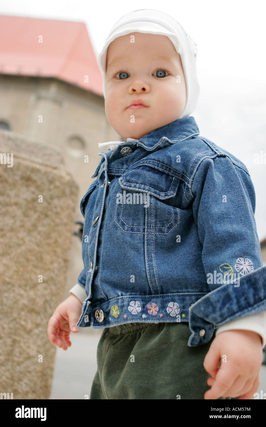 A little boy is learning to walk outdoor Stock Photo - Alamy