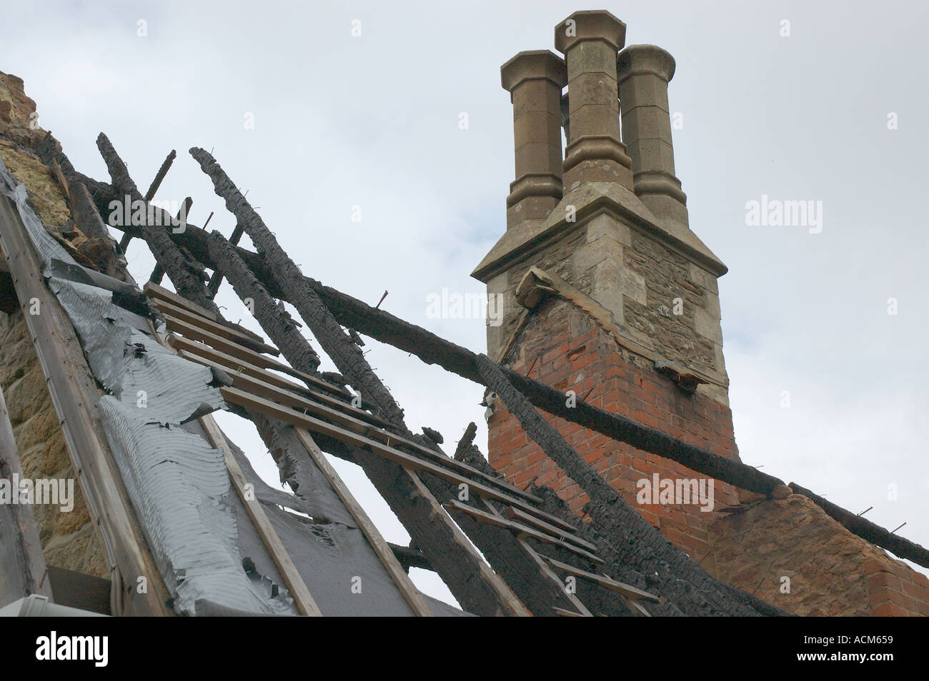 Building and roof with fire damage Stock Photo - Alamy