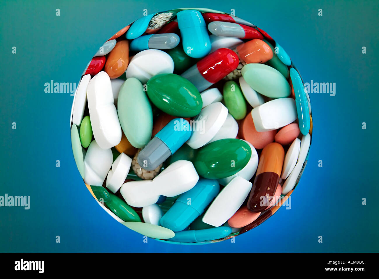 ball filled with many different colourful pills and capsules Stock ...
