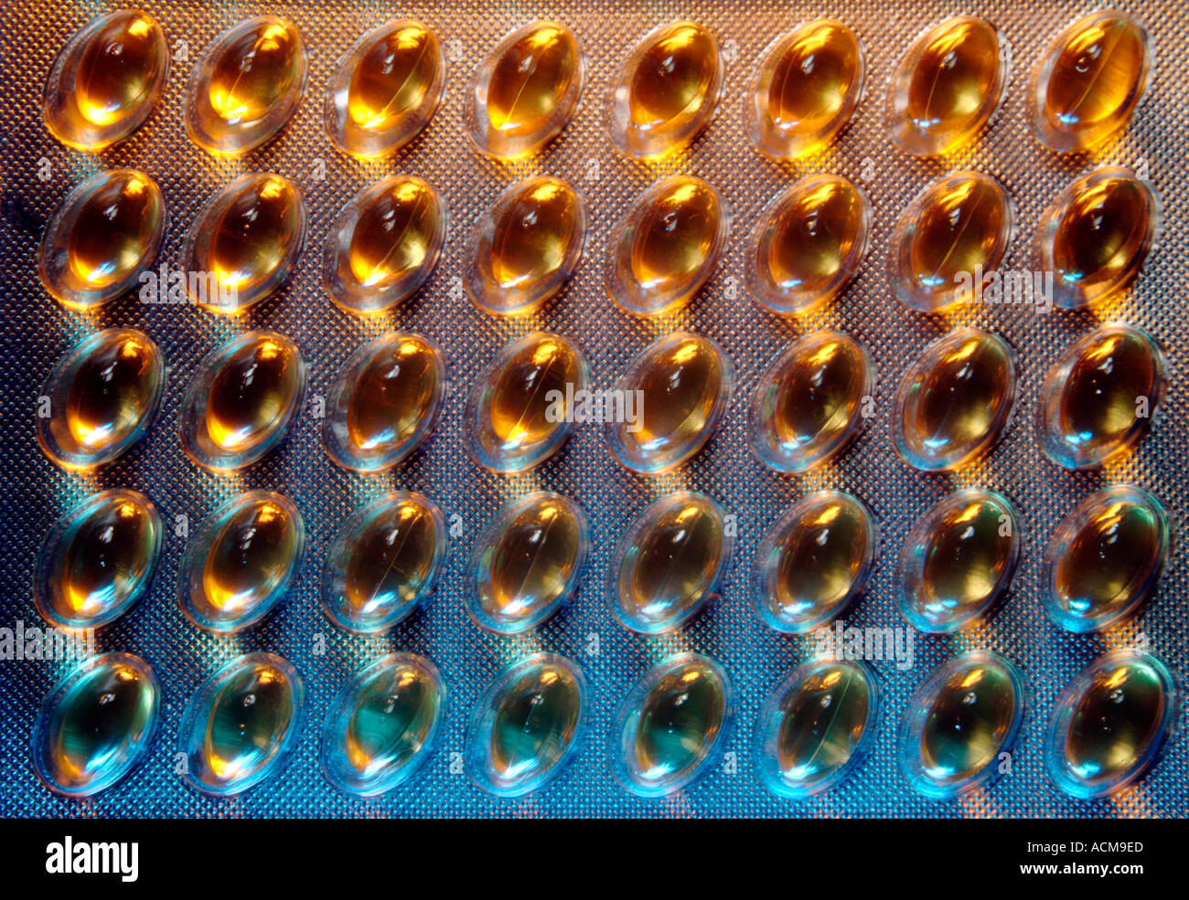 packing with many similar capsules Stock Photo - Alamy