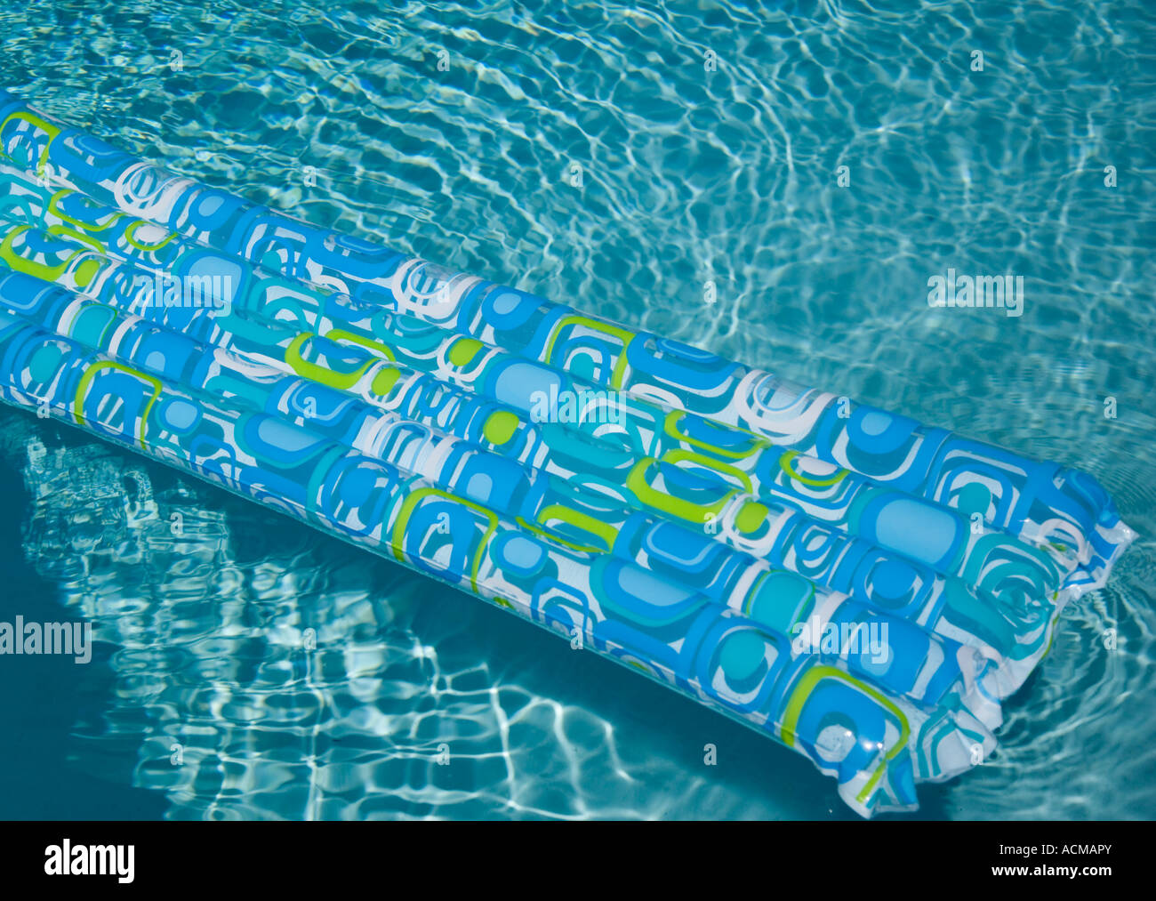 Inflatable raft in a backyard pool Stock Photo - Alamy