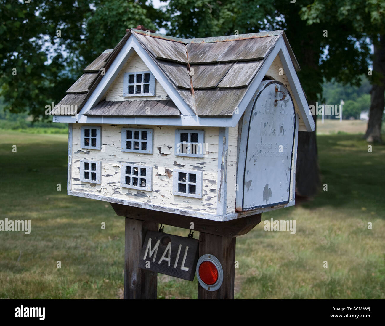Mailbox in the shape of a small house Stock Photo - Alamy