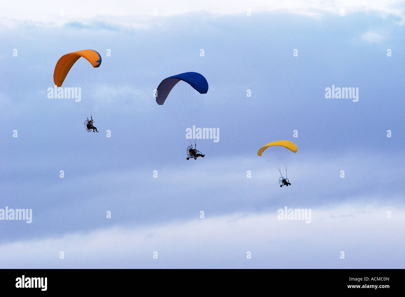 three powered paragliders in the air at the 4th annual Arizona Flying ...