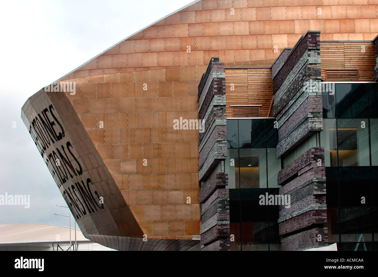 Steel roof treated with copper oxide and slate cladding frontage ...