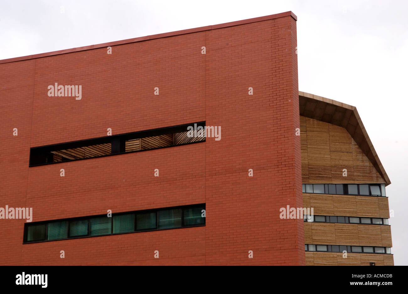 Red brick and timber cladding exterior details at the rear of the Wales ...
