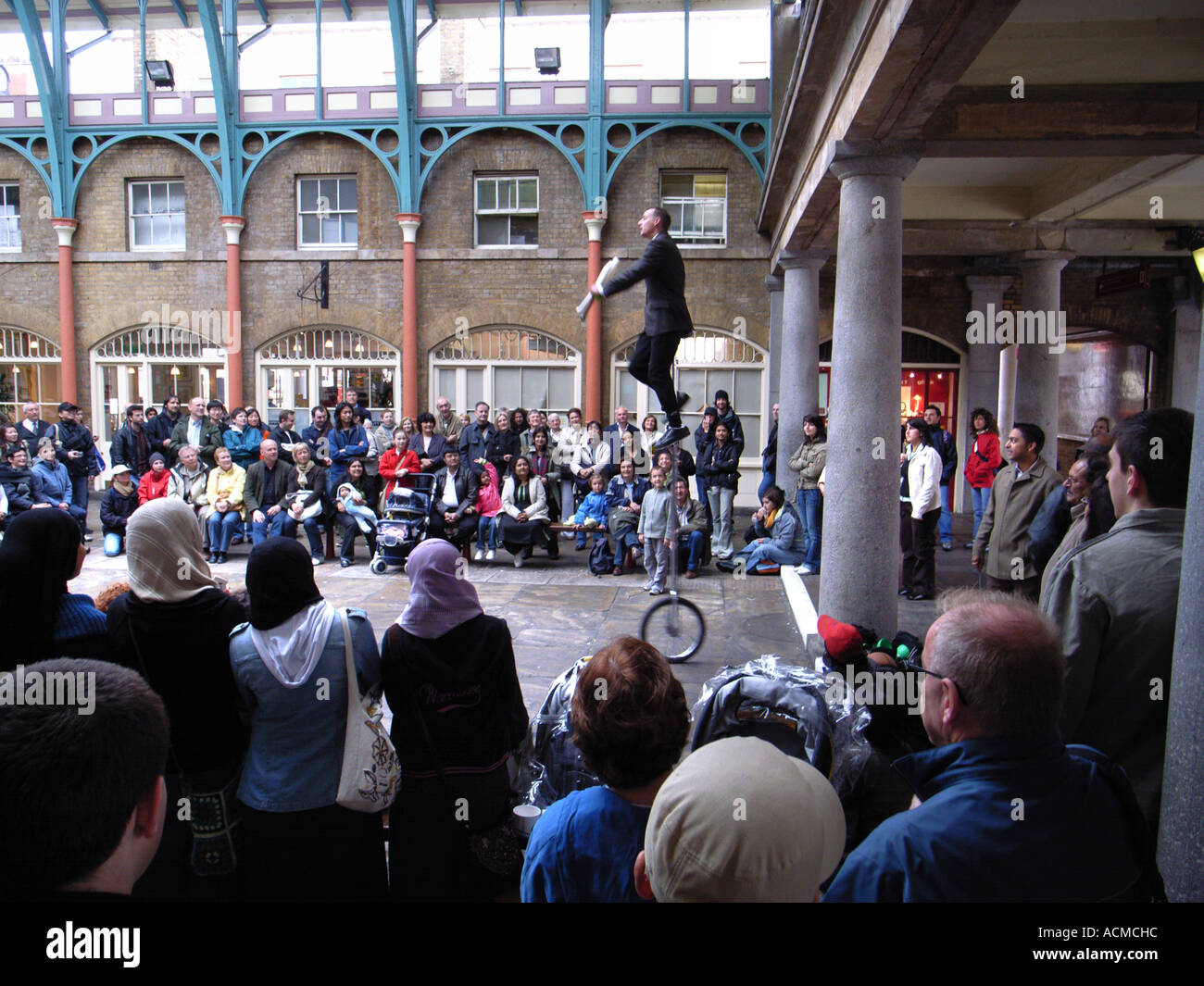Juggler street performer in the London Covent Garden Apple Market Stock ...