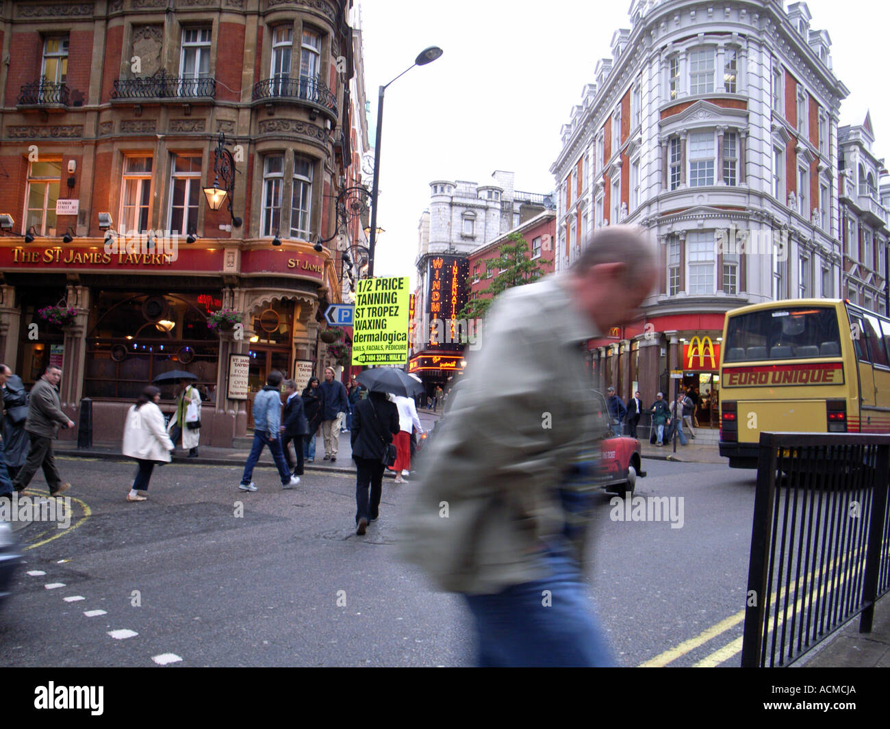 Downtown London England UK with pedestrians walking busy street scene ...