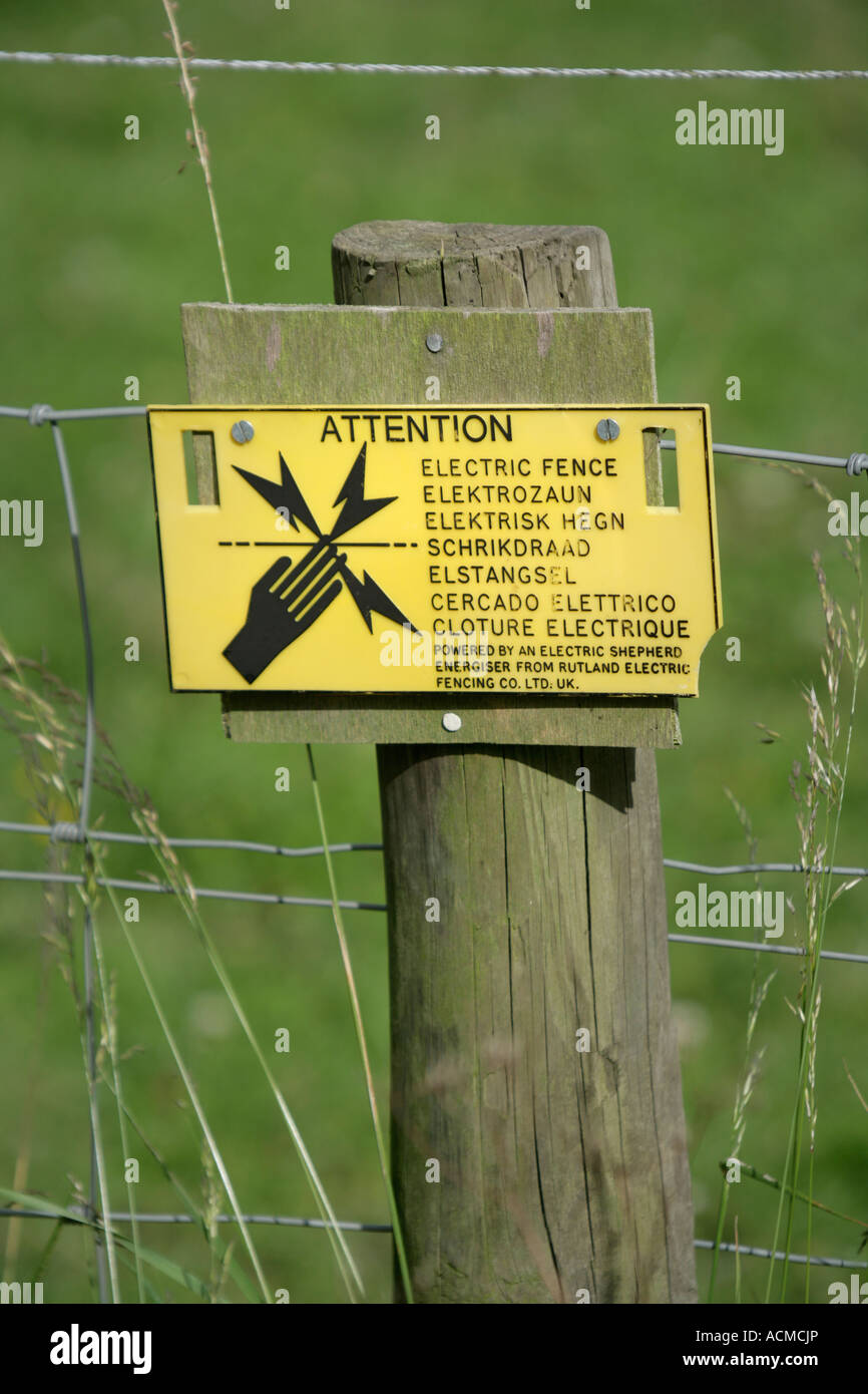Electric fence warning sign on fencing post, Essex England UK Stock ...