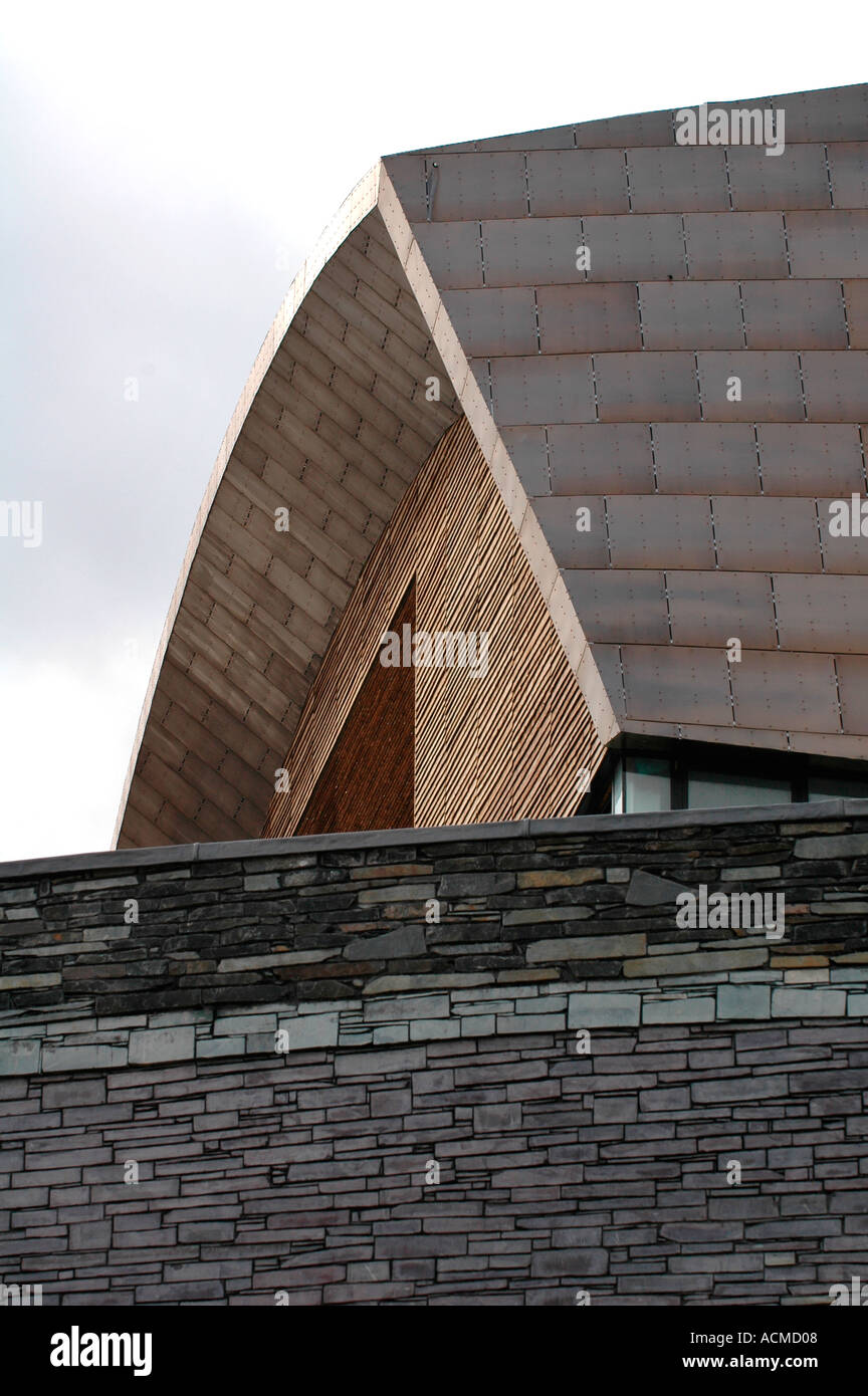 Welsh slate wall with timber cladding and stainless steel roof exterior ...