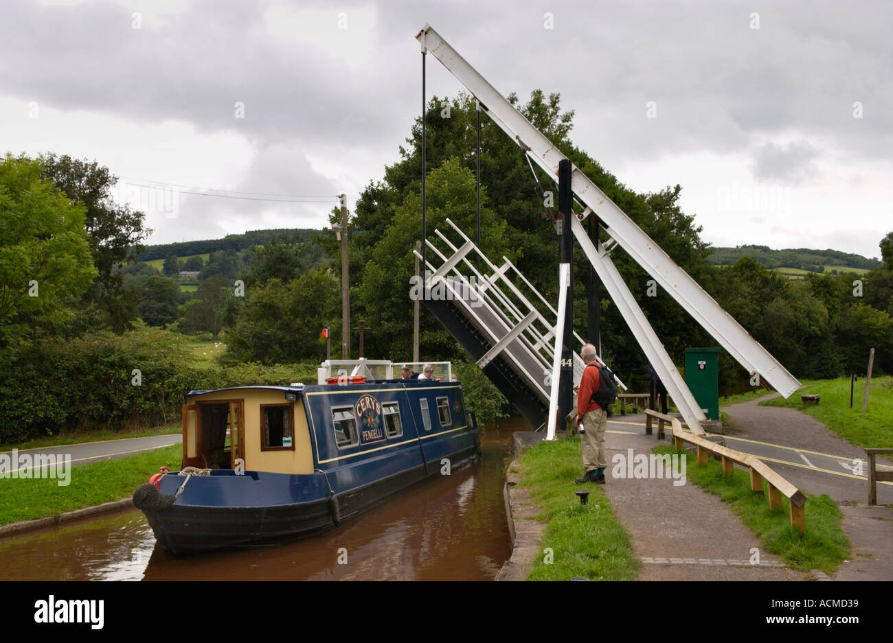 Canal barge using the lifting bridge on the Monmouthshire and Brecon ...