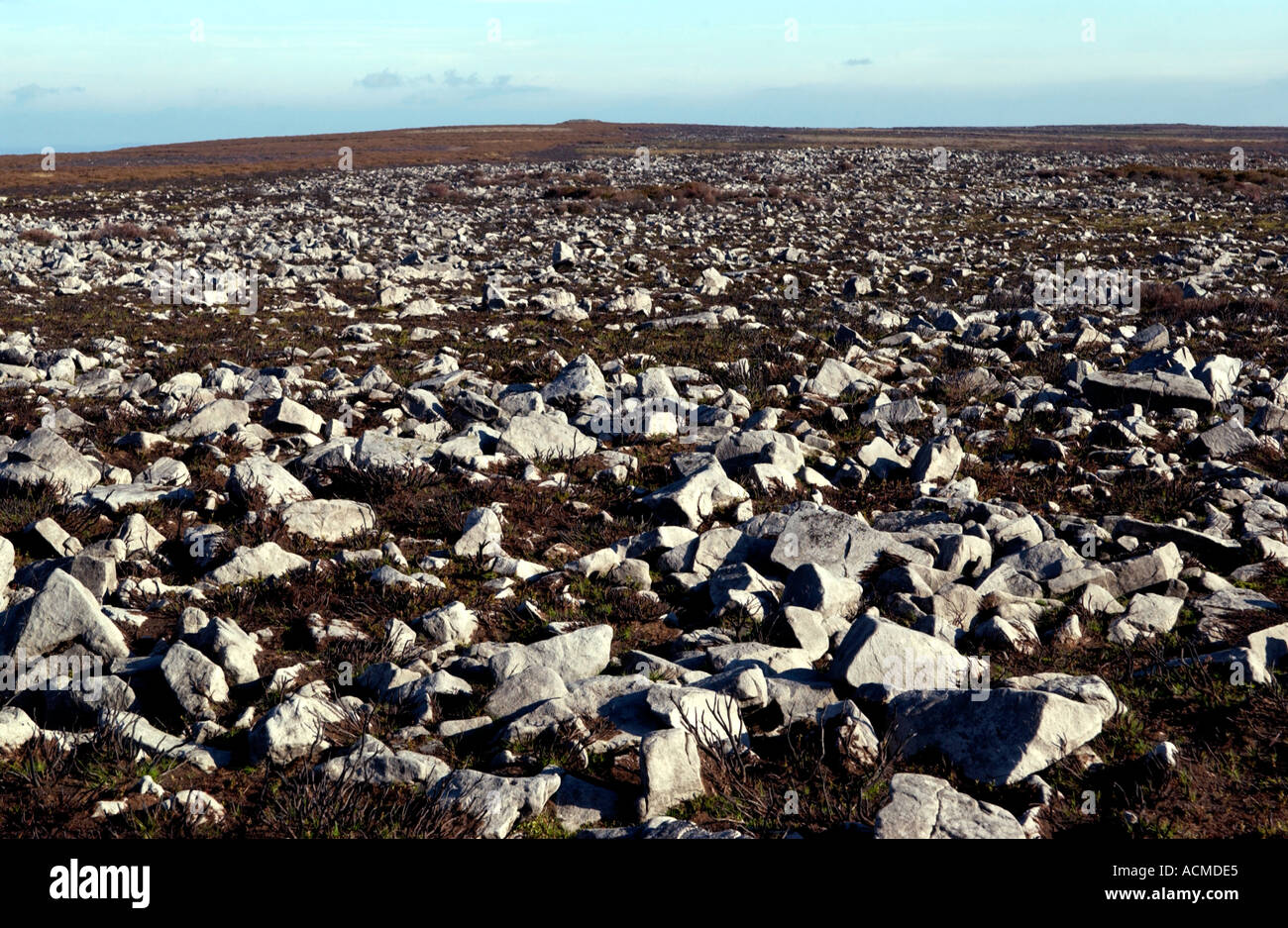 Limestone rocks exposed after fire devastated this heather moorland in ...