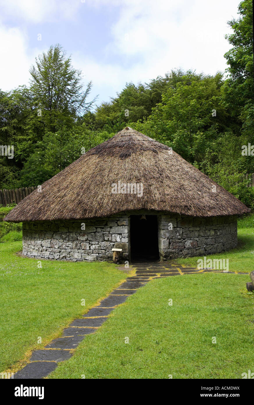 A reconstructed circular house inside the ringfort at Craggaunowen near ...