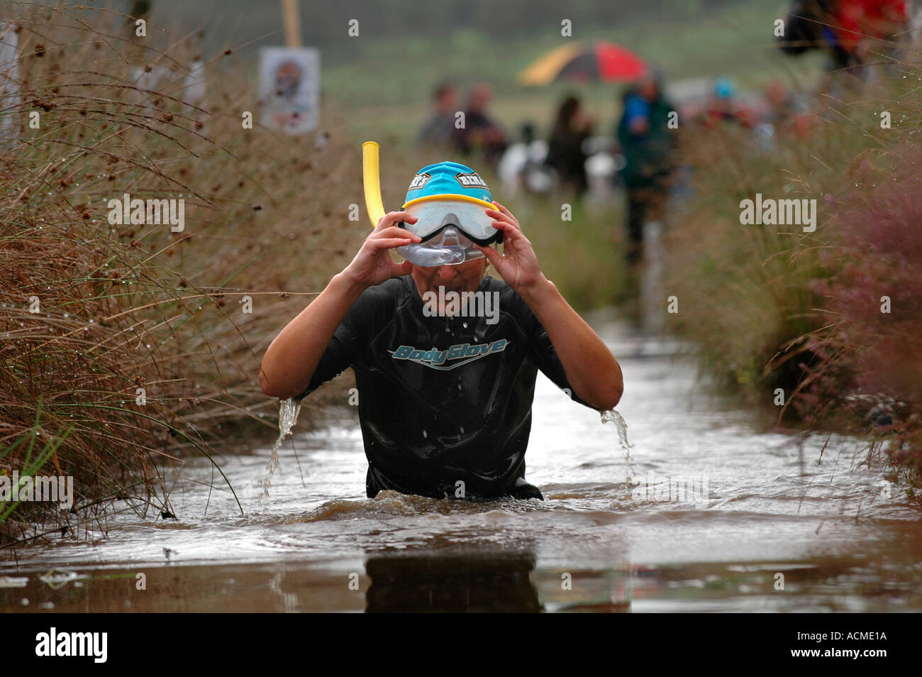 Competitor in the annual World Bog Snorkelling Championships at ...
