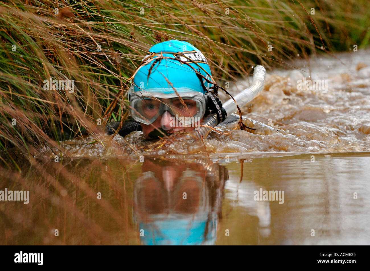 Competitor in the annual World Bog Snorkeling Championships at ...