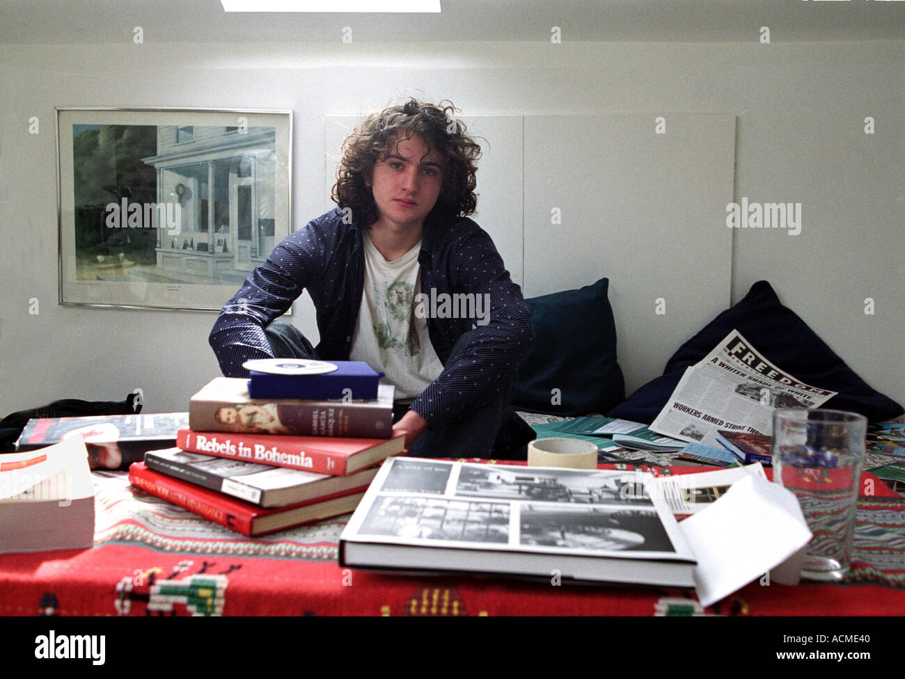 Teenaged boy studying in his room Stock Photo - Alamy