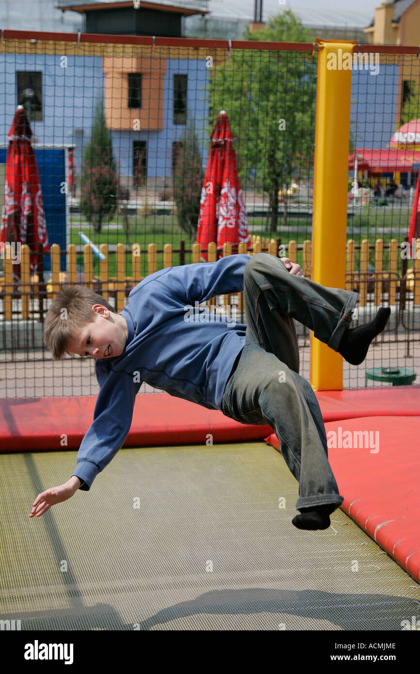 kid child playing on trampoline jumping bounce children plunge board ...