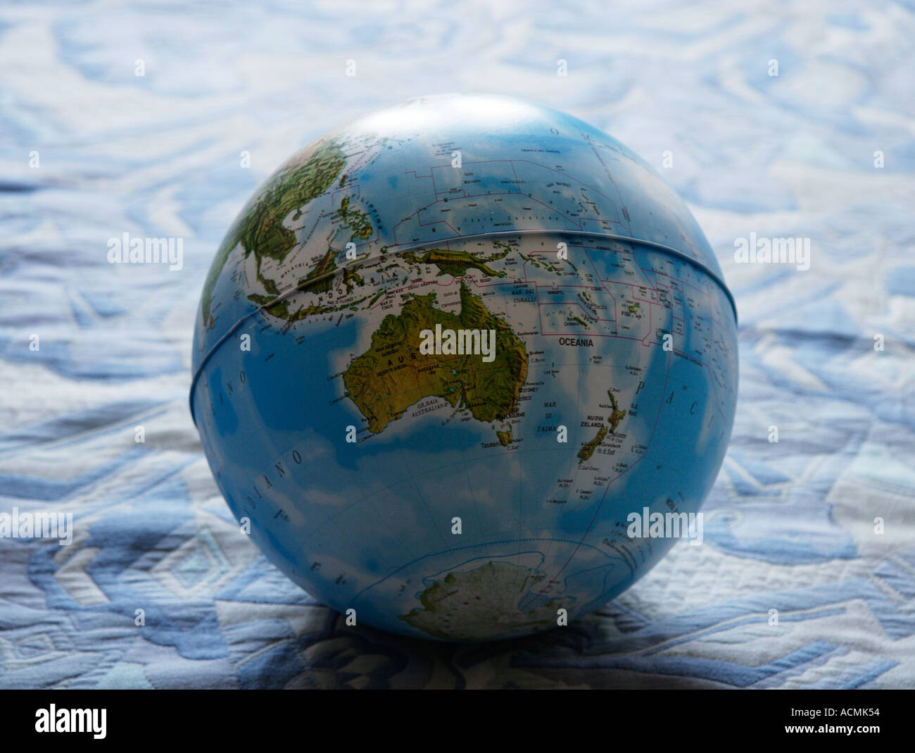 the map of the world ball sphere on the bed Stock Photo - Alamy